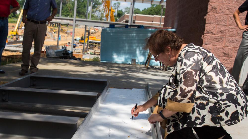 Beam-signing ceremony celebrates construction milestone at Penn State ...